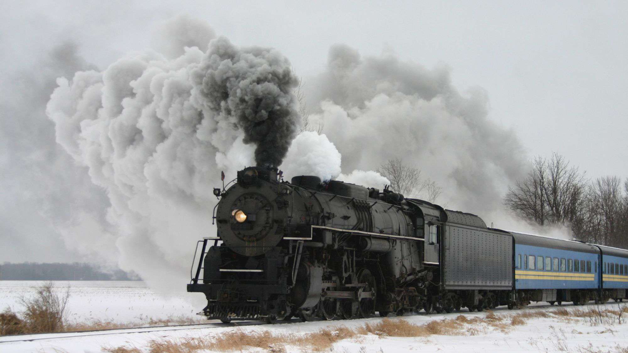 11 Snowy Train Rides That Prove Winter Might Just Be The Most Beautiful ...